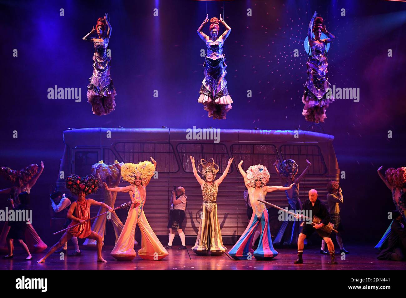 The cast of the musical Priscilla Queen of the Desert perform during a ...