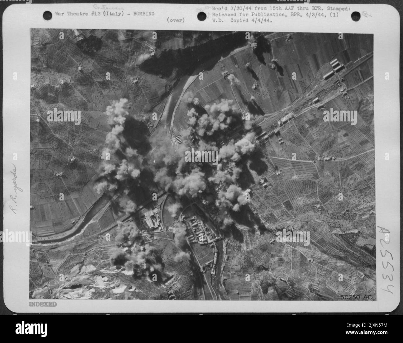 Fortress bombs of the 15th AAF smash the railroad yards at a vital ...