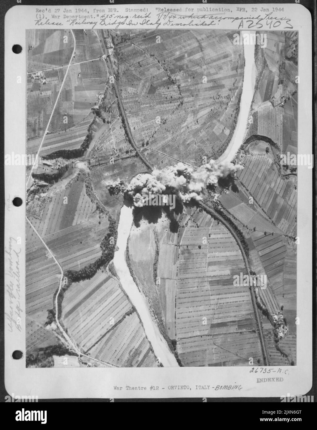 A near-perfect pattern of bomb bursts cover the German-held railway ...