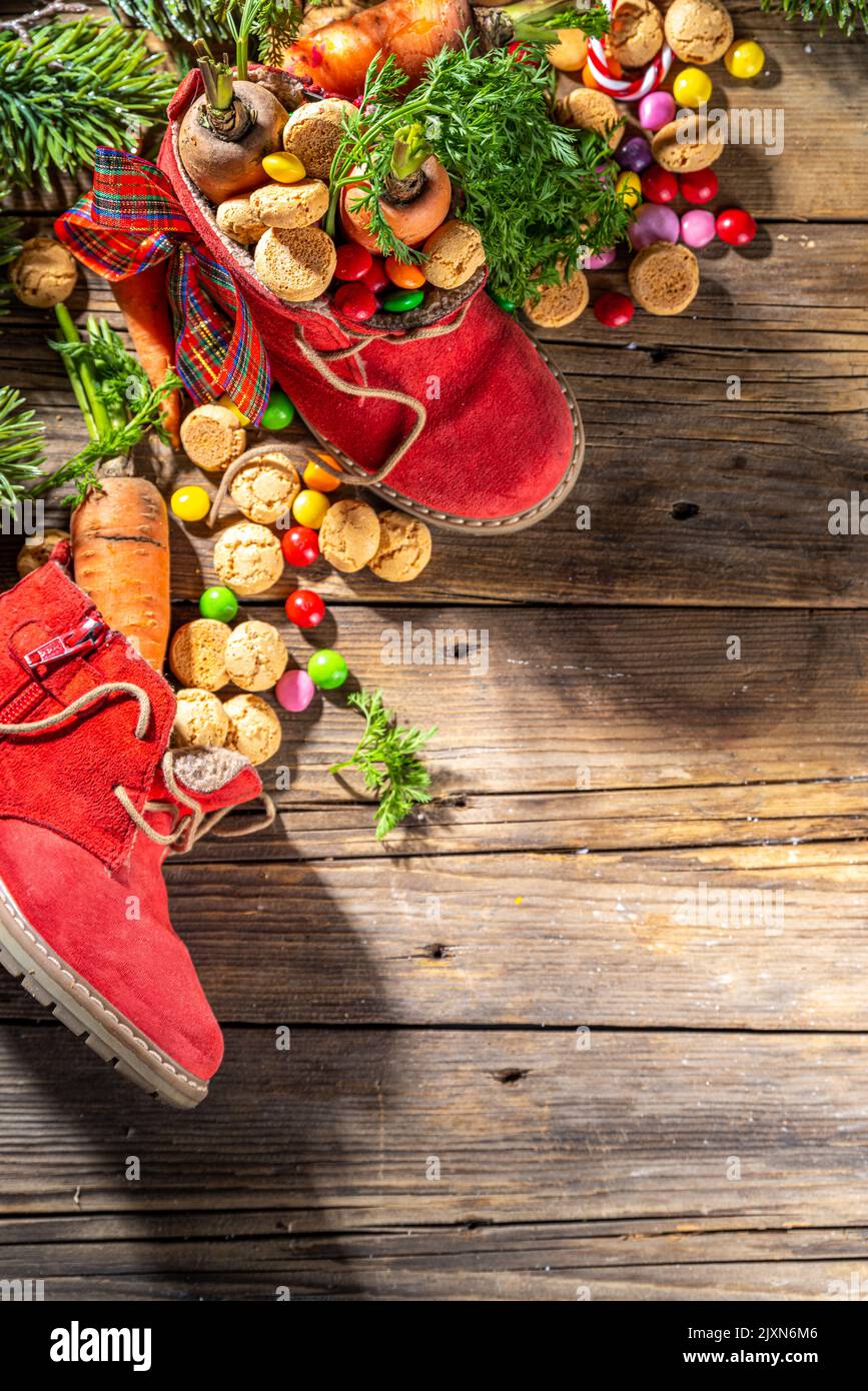 Sinterklaas, Saint Nicholas day background. Little kid red shoe with ...