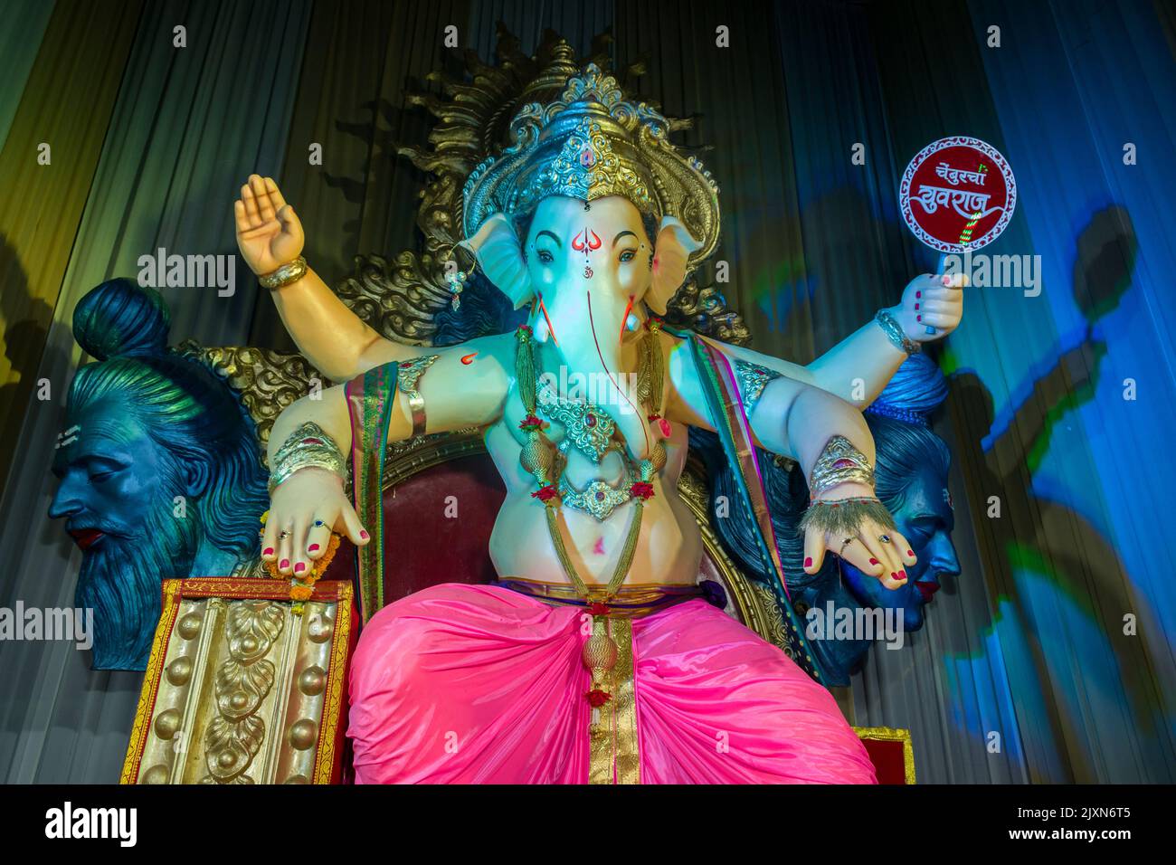 A beautiful idol of Lord Ganesha being worshipped at a mandal in Mumbai ...
