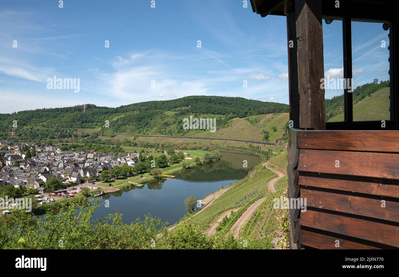 The beautiful view of the village and river surrounded by green hills ...