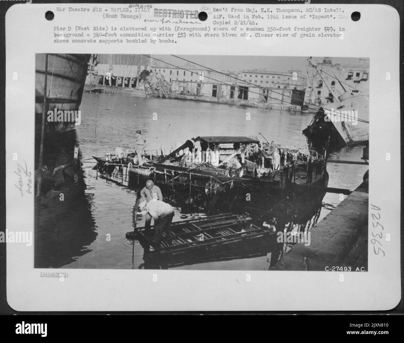Pier D (West Side) is cluttered up with (foreground) stern of a sunken ...