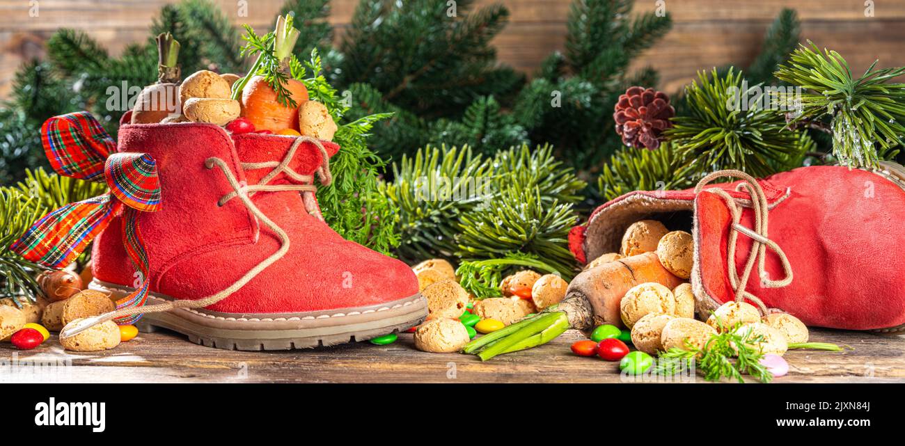 Sinterklaas, Saint Nicholas day background. Little kid red shoe with ...