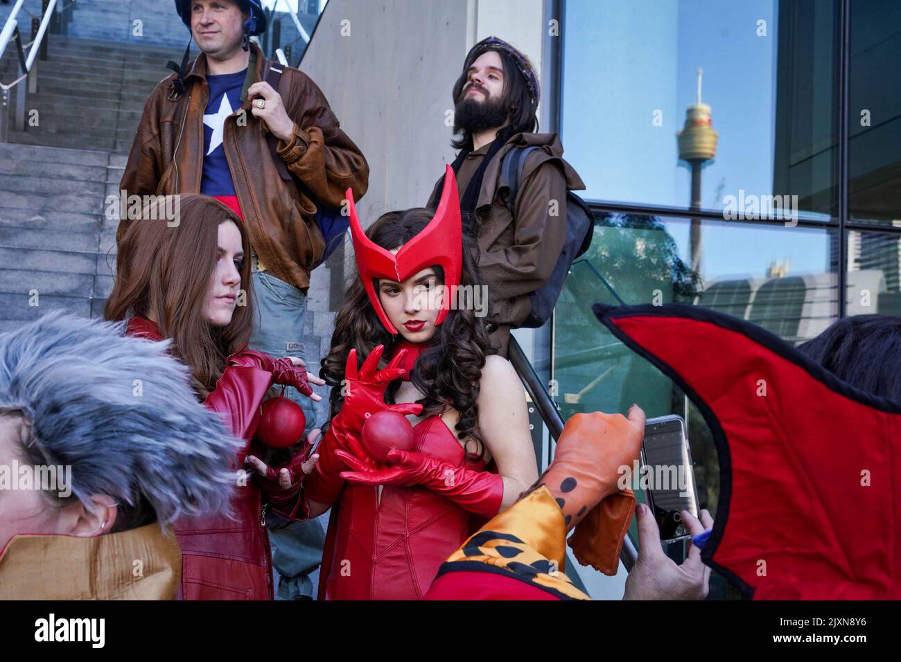 Cosplayers pose for photographs during the Oz Comic-Con at the ...