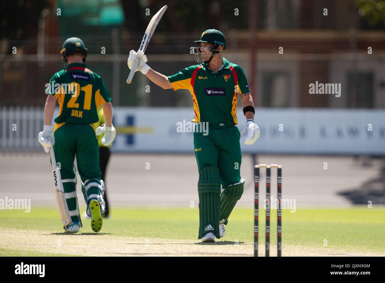 Ben Mc Dermott of Tasmania celebrates his half century during the match ...
