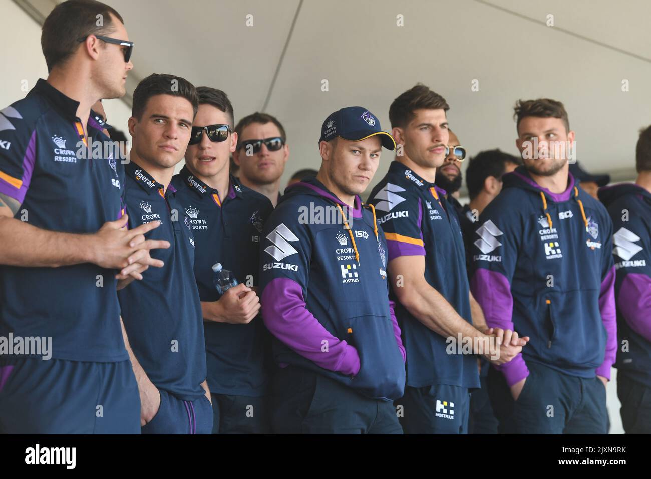 Storm players are seen on a stage during Melbourne Storm Fan Day at ...