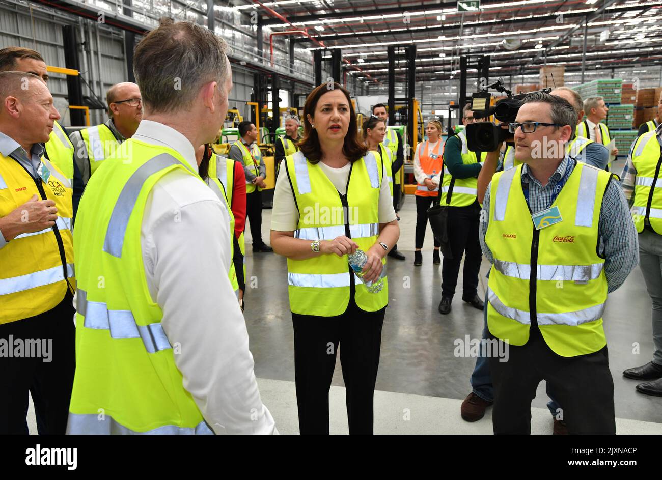 Queensland Premier Annastacia Palaszczuk (centre) is seen during a tour ...