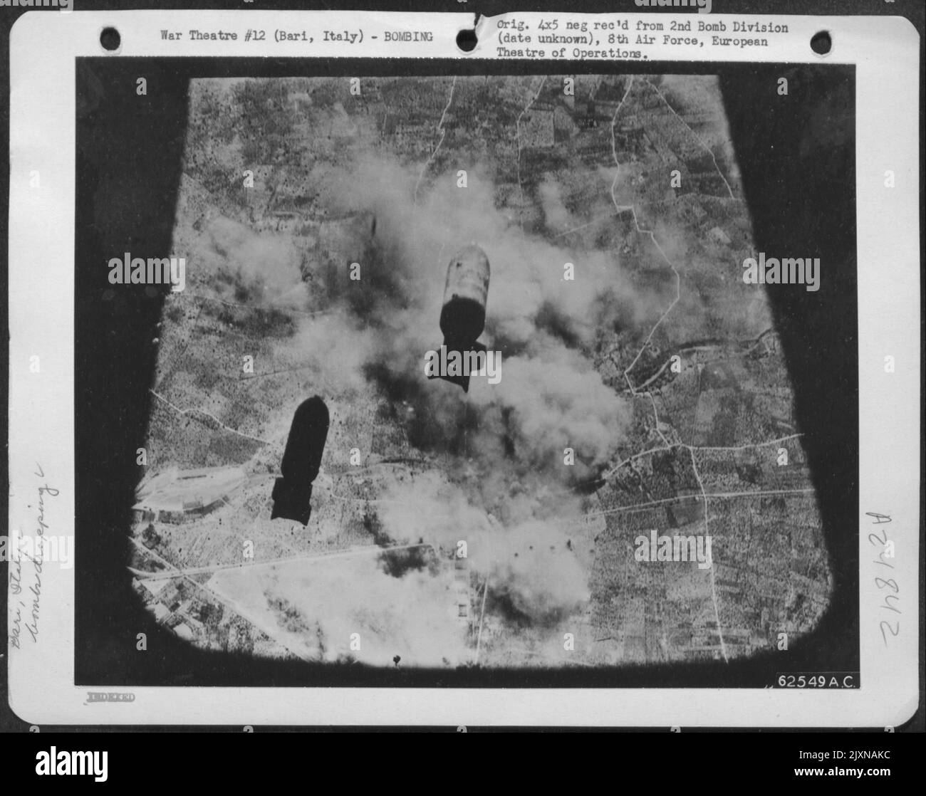 Framed By The Bomb Bay Doors, Bombs From Planes Of The 2Nd Bomb ...