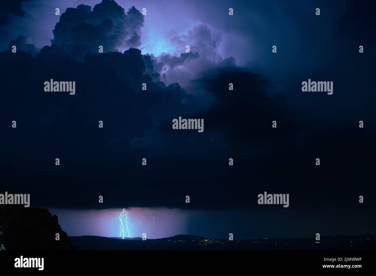 A mesmerizing view of a dramatic stormy cloudy sky at night with ...