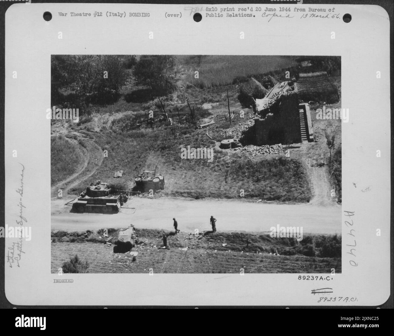 A German Tank And Car Lie Useless Beside The Road Somewhere Between ...