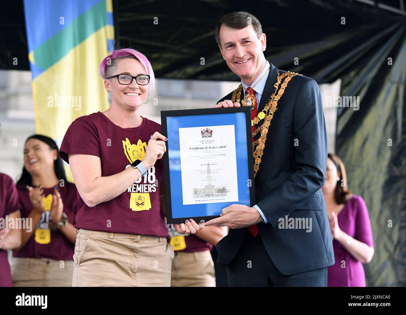 Chelsea Baker (left) poses for photographs with Brisbane's Lord Mayor ...