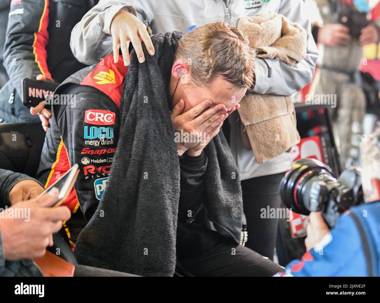 David Reynolds of Erebus Penrite Racing reacts with leg cramps during ...