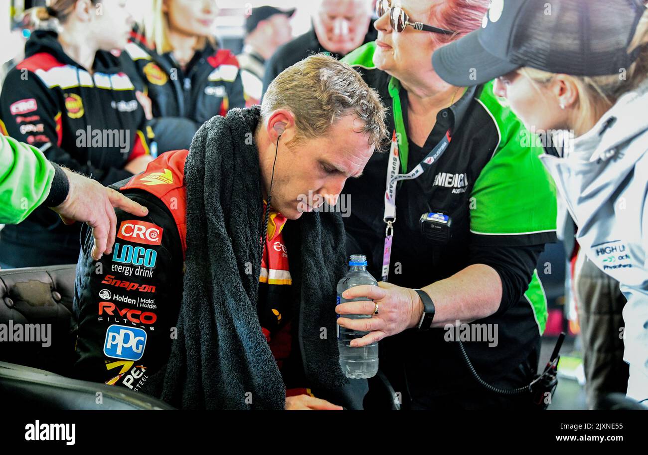 David Reynolds of Erebus Penrite Racing reacts with leg cramps during ...
