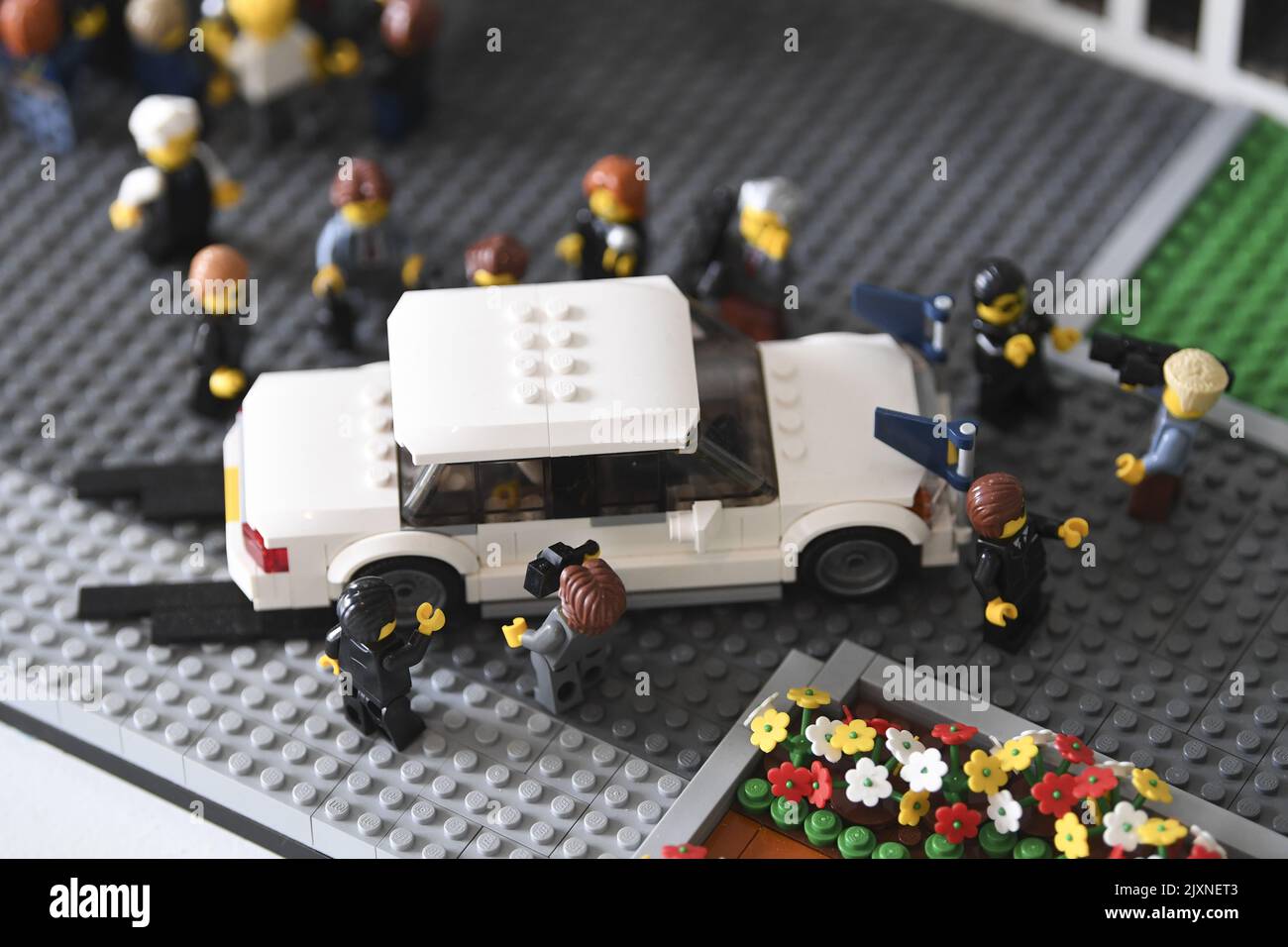 The Prime Minister's car surrounded by journalists is seen in a model ...