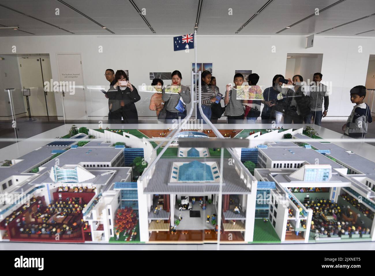 Visitors take a look at a model of Parliament House made from Lego ...