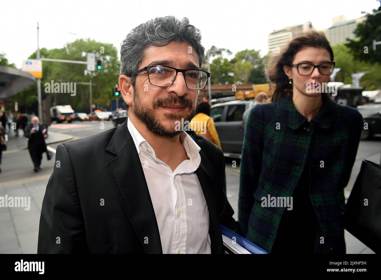 Kurdish journalist Renas Lelikan (left) arrives at the Downing Centre ...