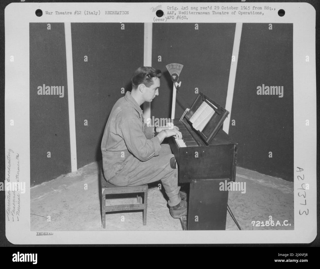S/Sgt. Edgar L. Wallace Of Philadelphia, Pa., Plays The Organ And ...