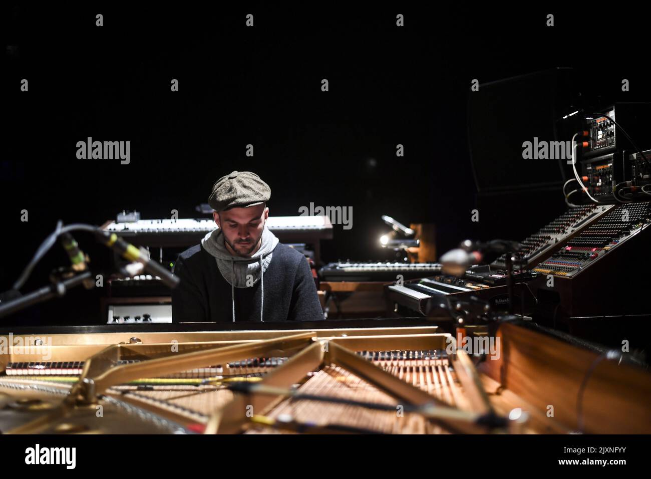 German pianist and composer Nils Frahm at his instruments poses for ...