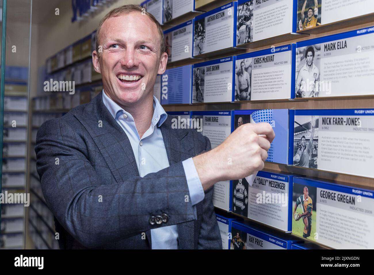 Darren Lockyer poses for a photograph with his plaque during the 2018 ...