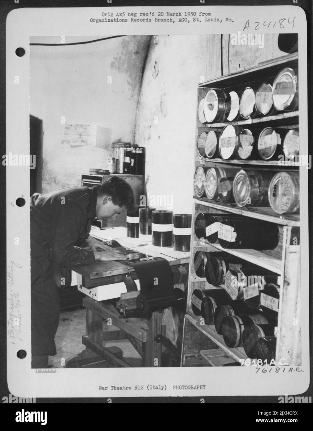 A Member Of The 90Th Photo Reconn Wing Letters Film At An Air Base ...