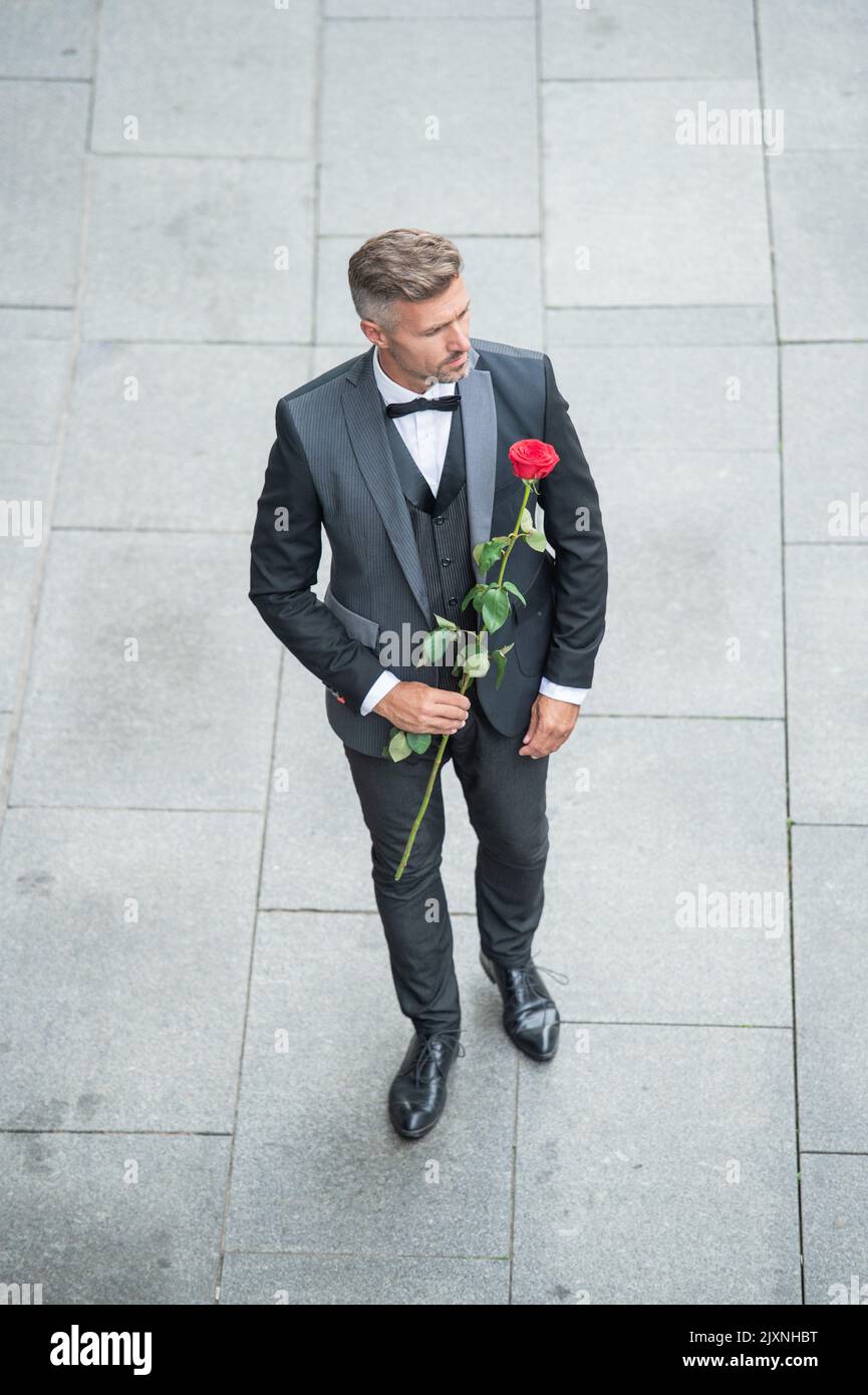 engagement date. caucasian tuxedo man celebrates engagement. man with ...