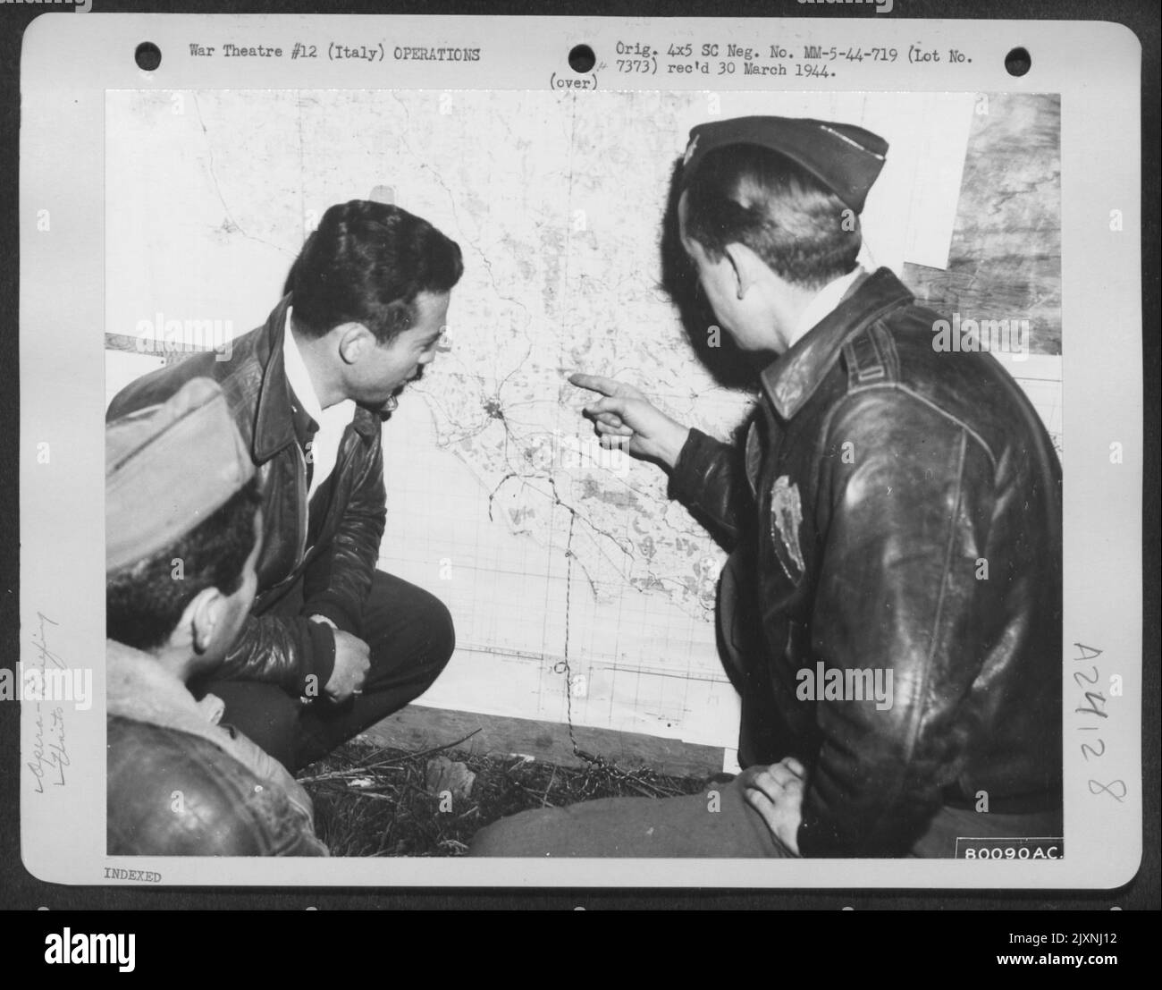 Pilots Of The 307Th Fighter Squadron Look Over A Briefing Map In The ...