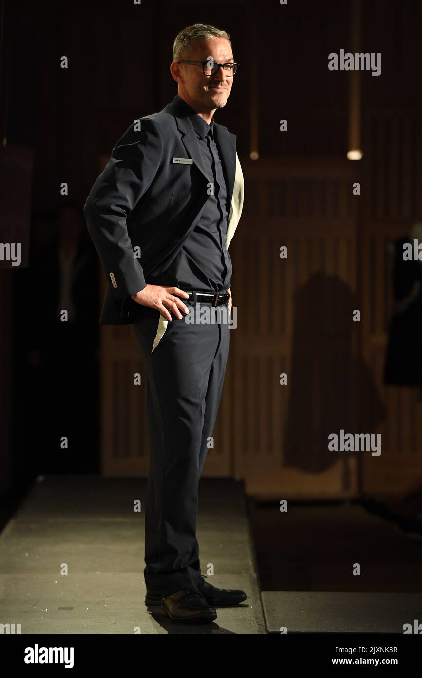 A model wears a piece from the new Sydney Opera House uniform ...