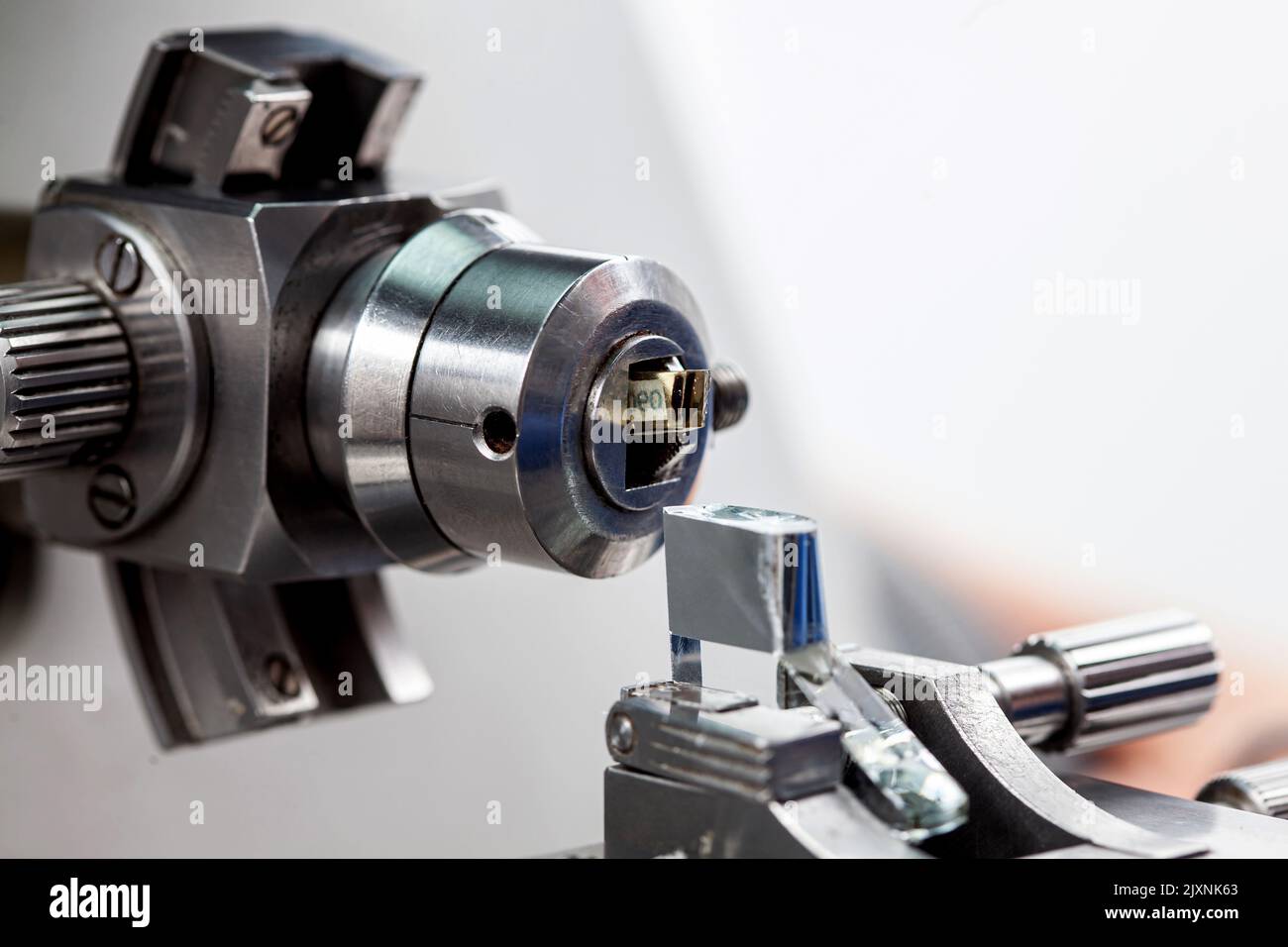 Closeup of an epoxy embedded tissue placed on the ultramicrotome to ...