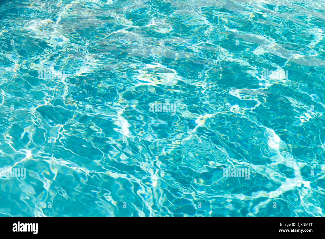 turquoise color background of swimming pool water with ripples in miami ...
