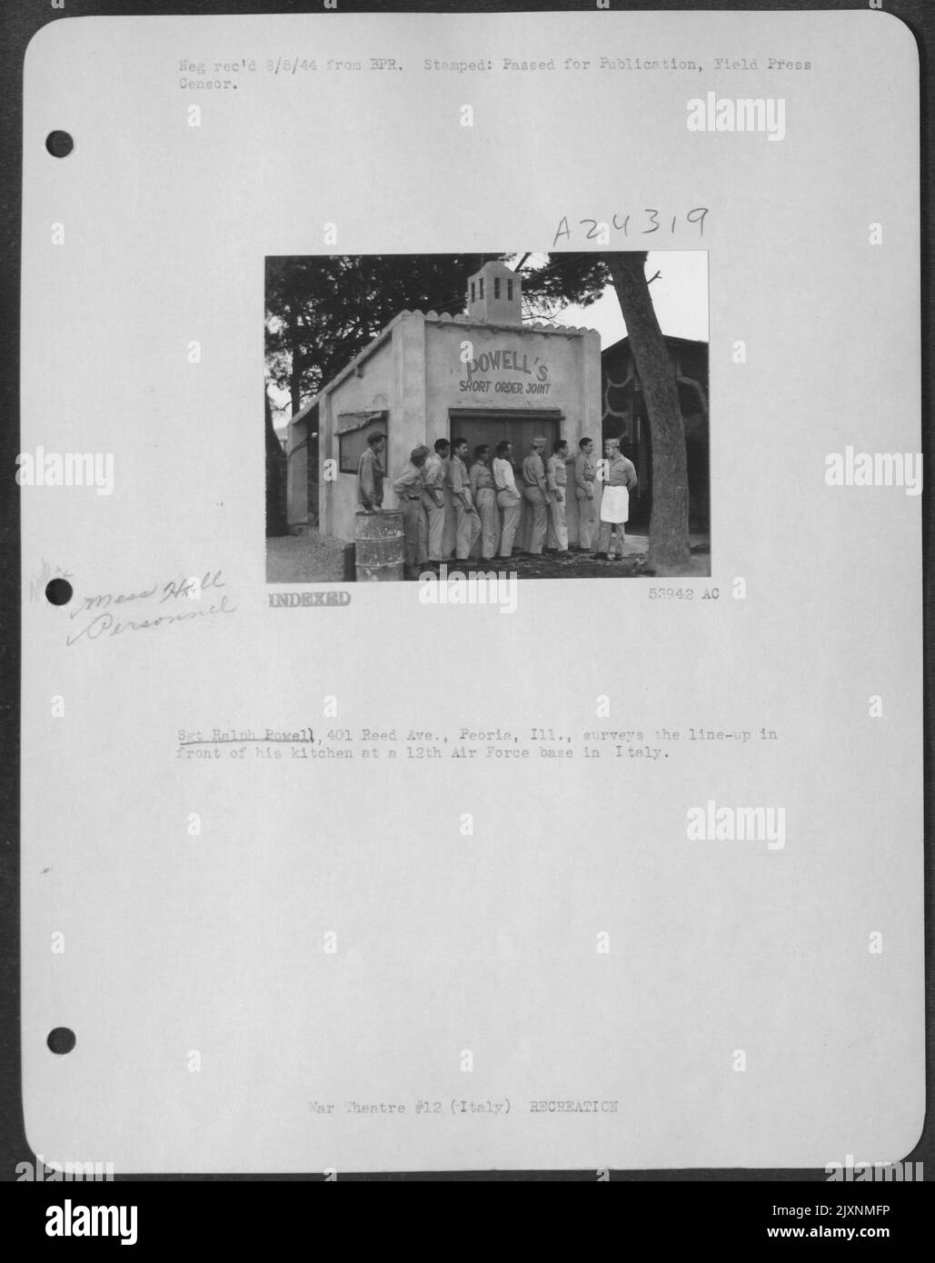 Sgt Ralph Powell, 401 Reed Ave., Peoria, Ill., surveys the line-up in ...
