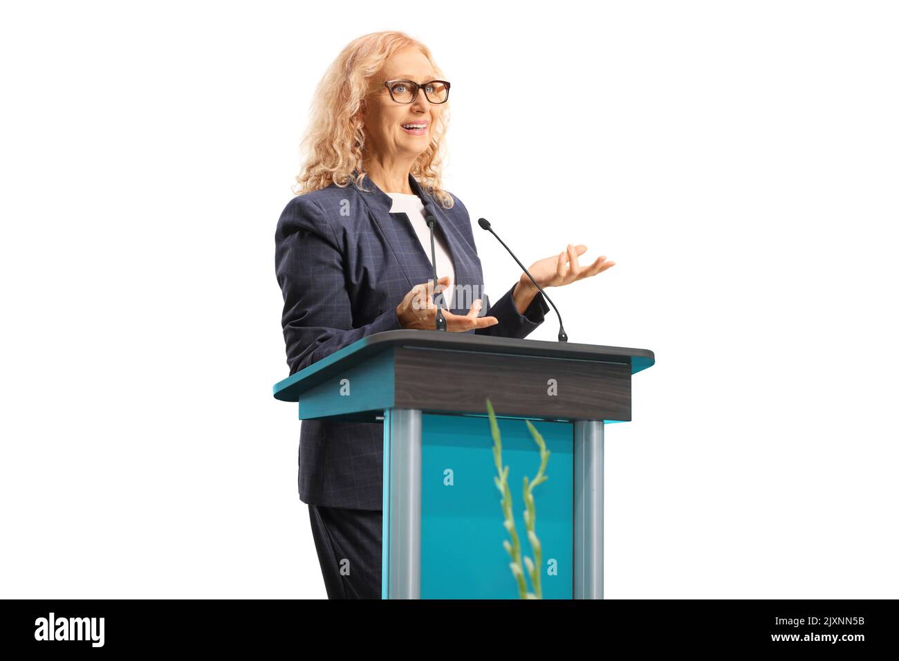 Professional woman giving a speech on a stand isolated on white ...