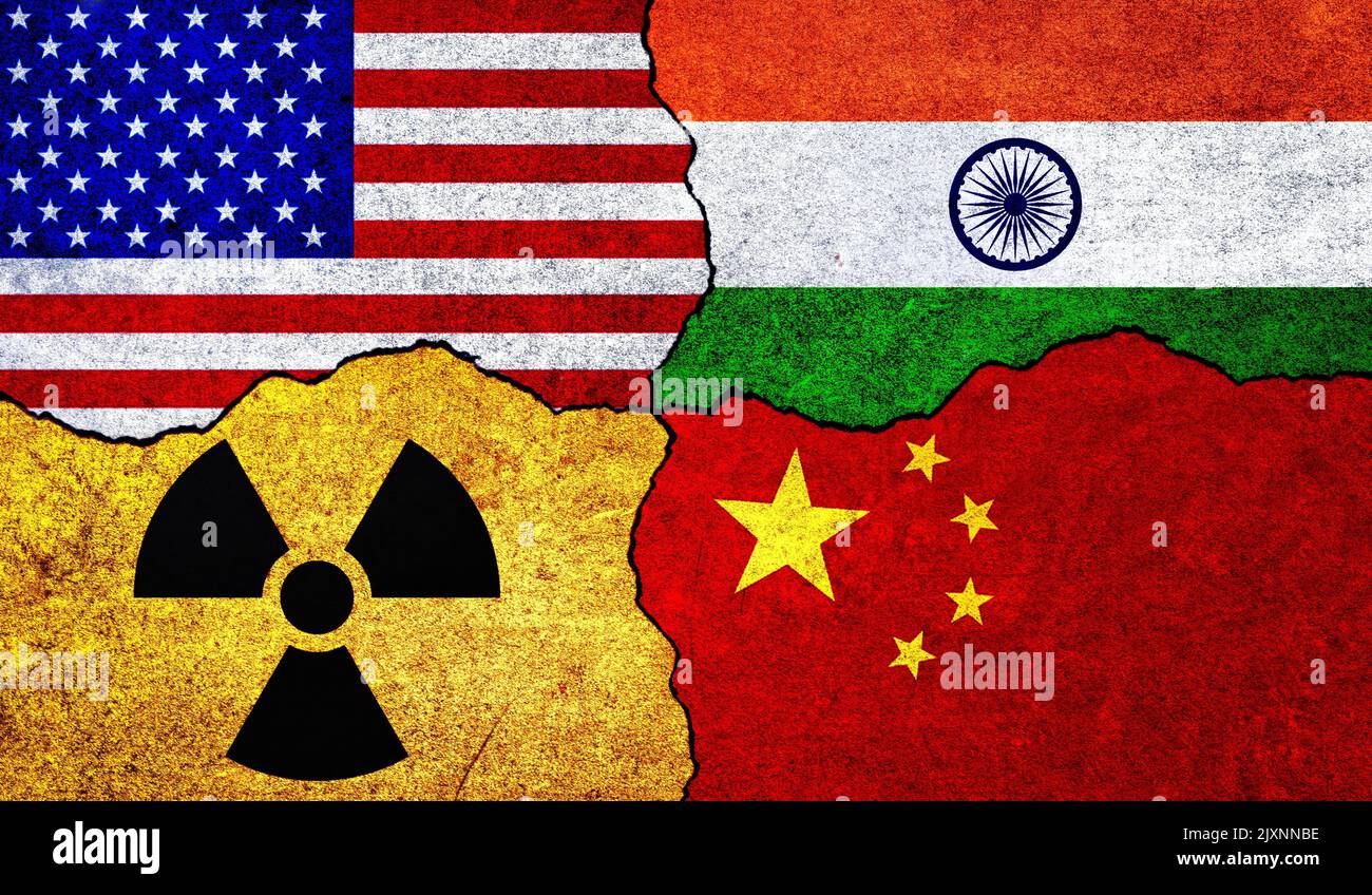 Flags of USA, India, China and radiation symbol on a wall. United ...