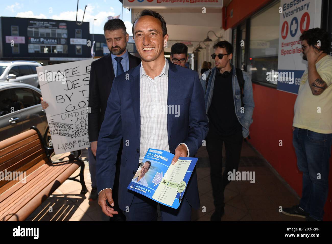 Liberal candidate for Wentworth Dave Sharma is seen handing out how to ...