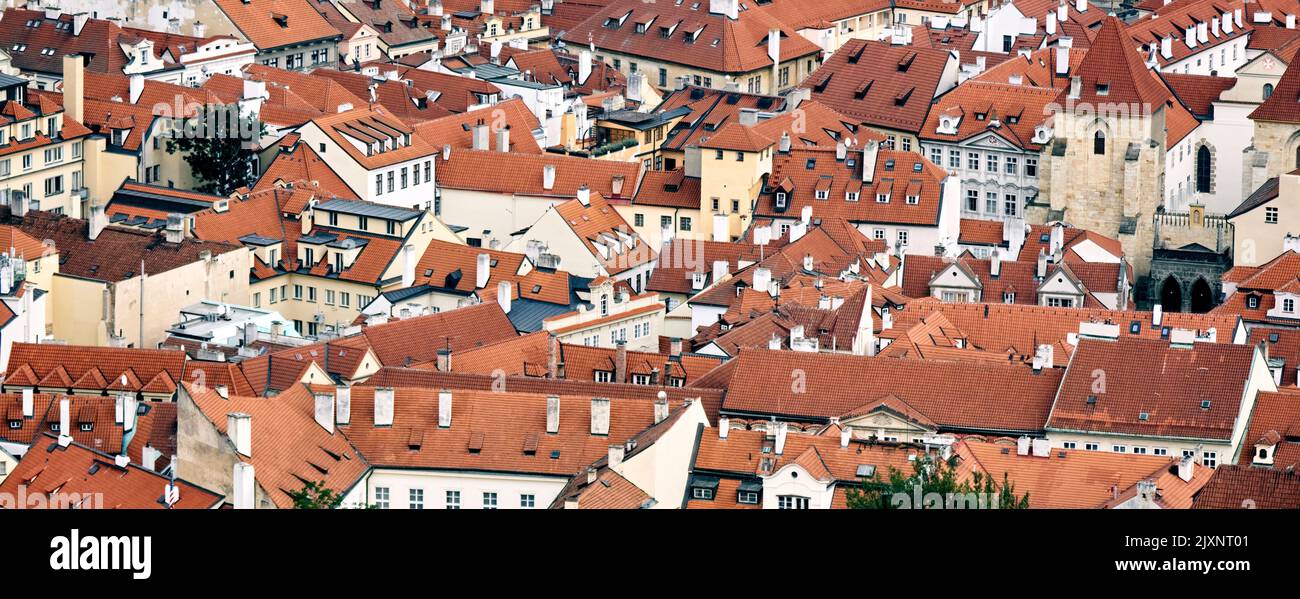 Aerial view of the roofs of closely spaced houses in a European old ...