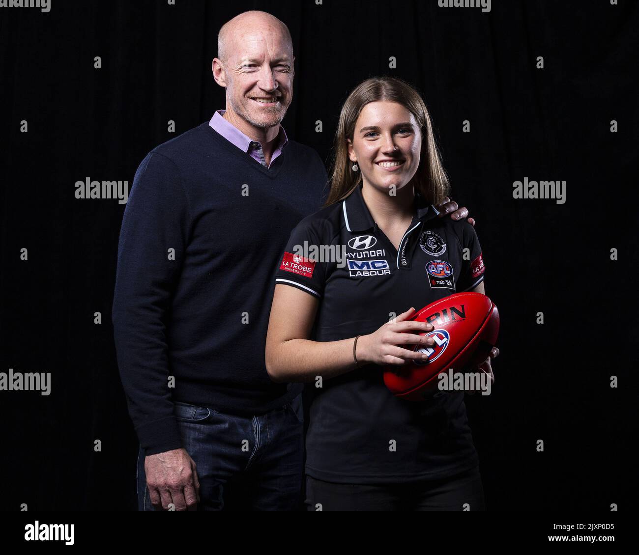 Abbie McKay of the Blues poses for a photograph with her father Andrew ...