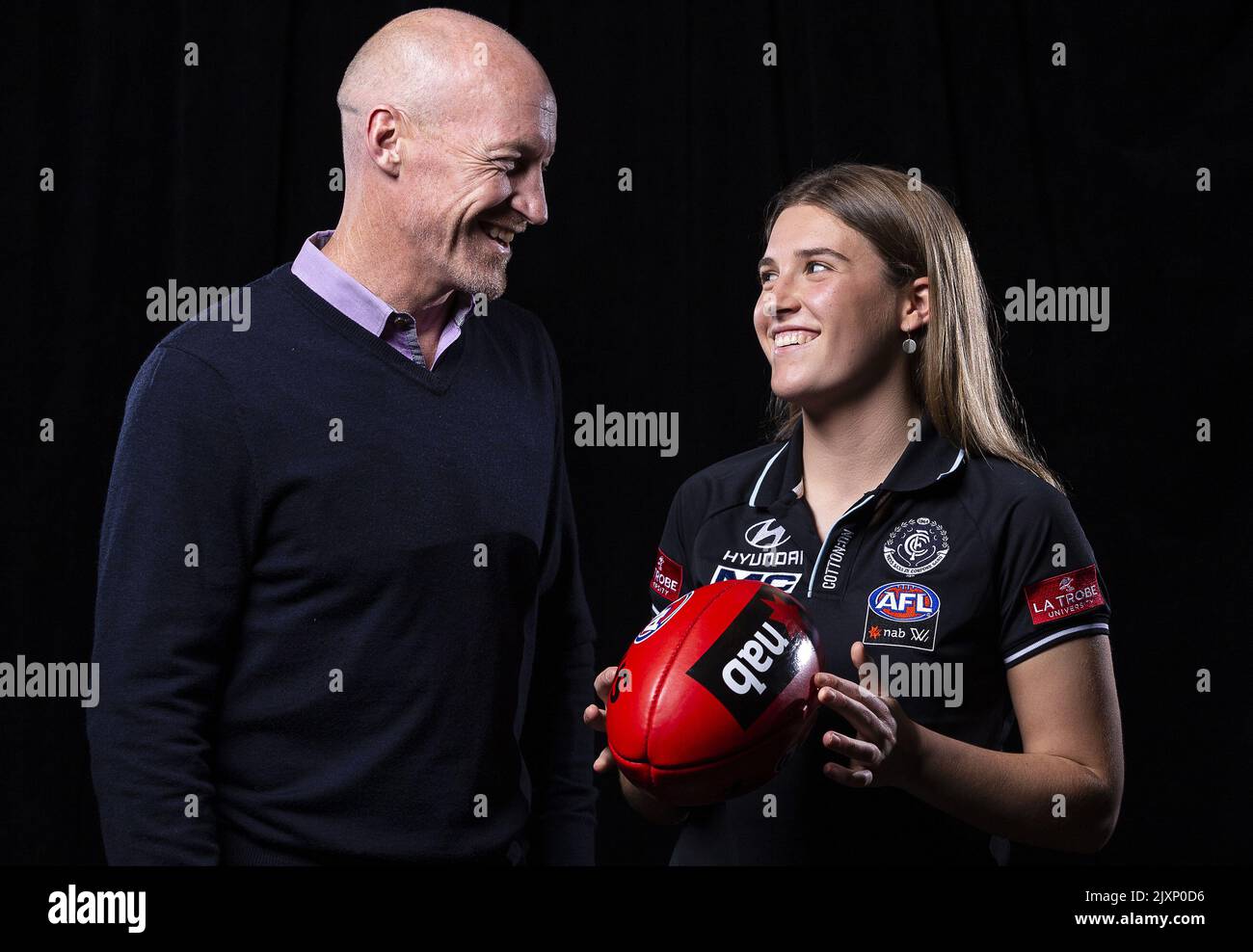 Abbie McKay of the Blues poses for a photograph with her father Andrew ...