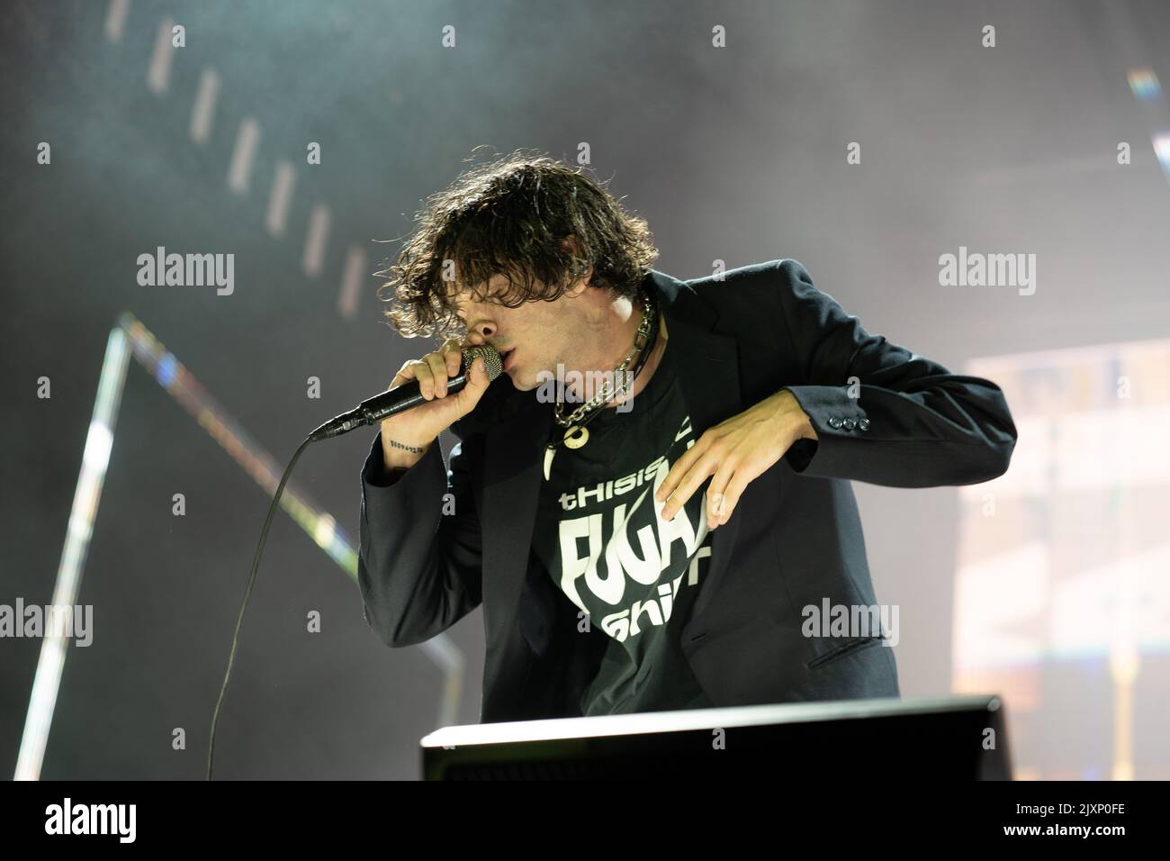The 1975 are seen playing on the main stage at the Leeds Festival at ...