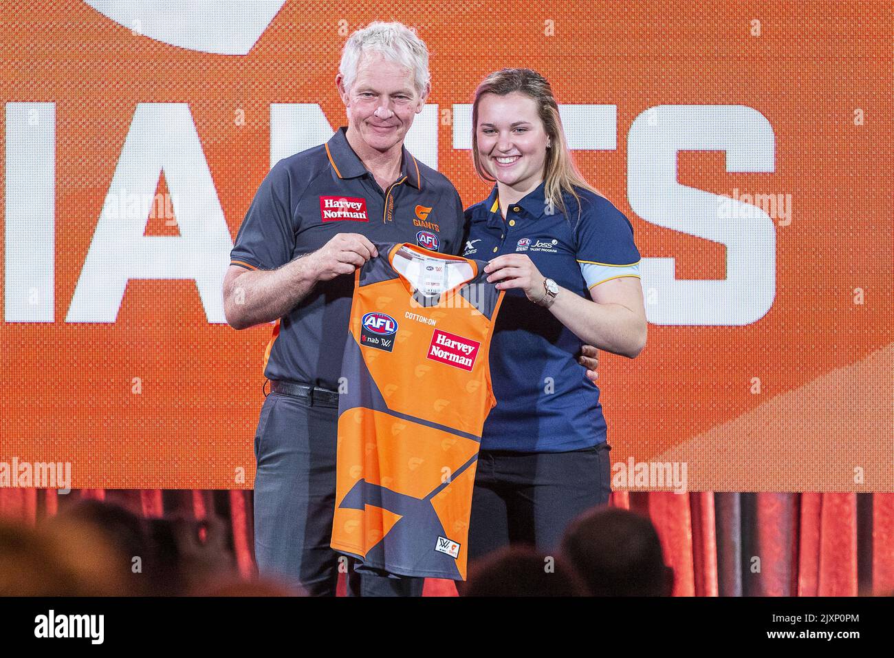 Giants head coach Alan McConnell and number 12 pick Alyce Parker pose ...