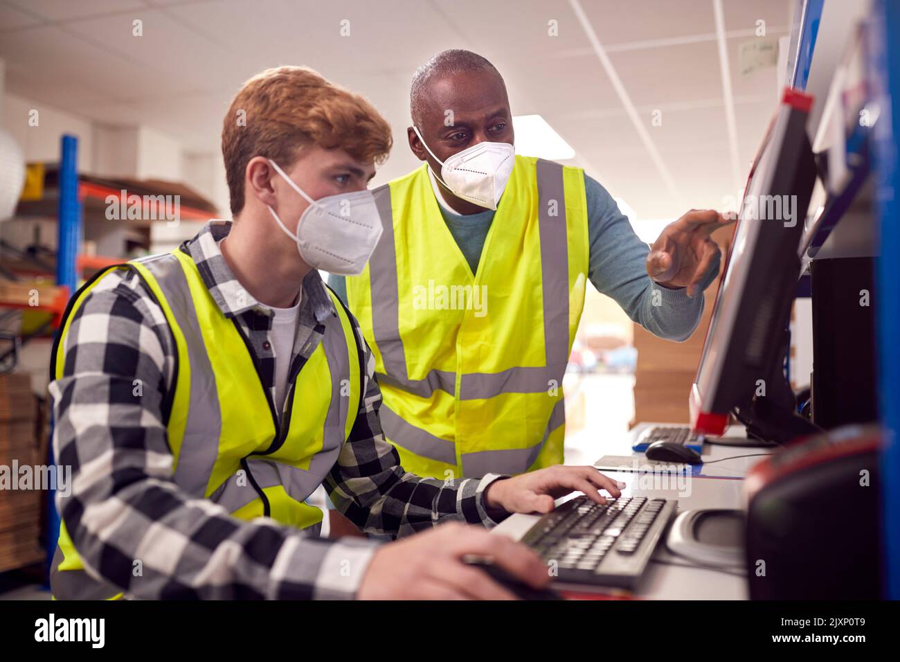 Wearing ppe in warehouse hi-res stock photography and images - Alamy