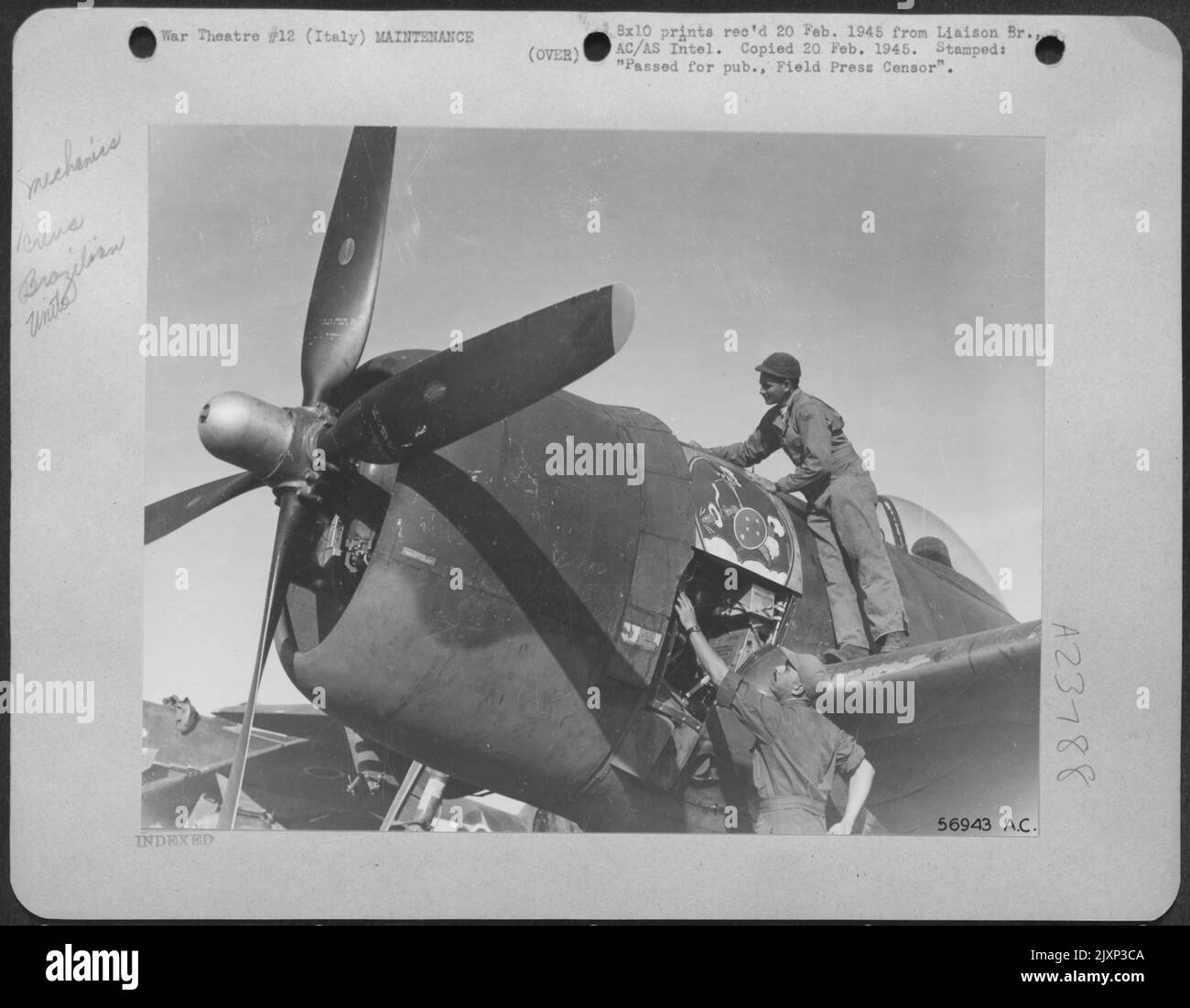 Two Brazilian plane mechanics servicing the Republic P-47's that the ... Two Brazilian plane mechanics servicing the Republic P-47's that the ...