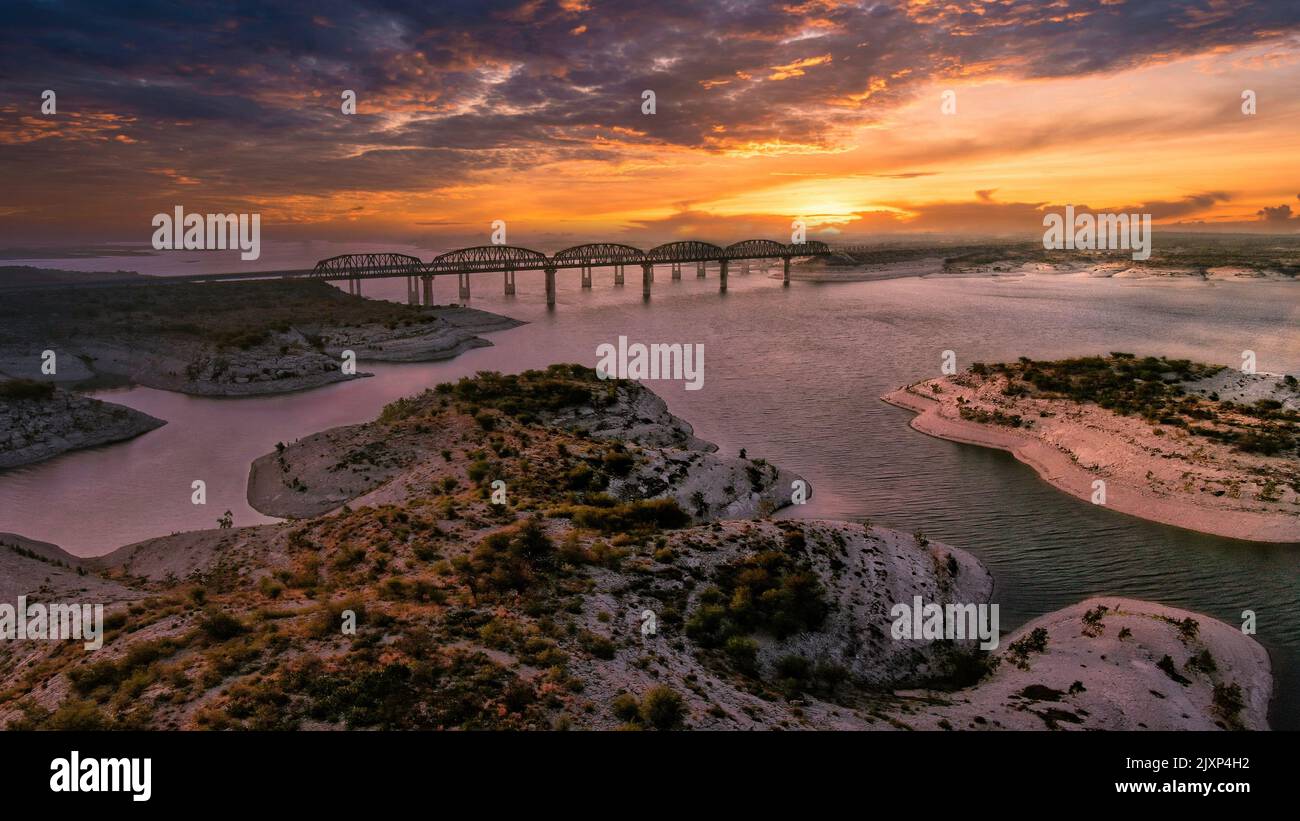 An aerial view of Amistad Reservoir with the Governor's Landing Bridge ...