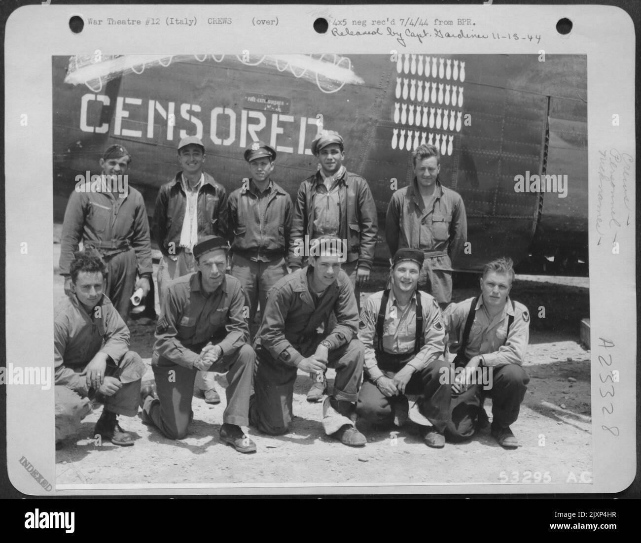 Kneeling from left to right are: T/Sgt Dale R. Bails, aerial engineer ...