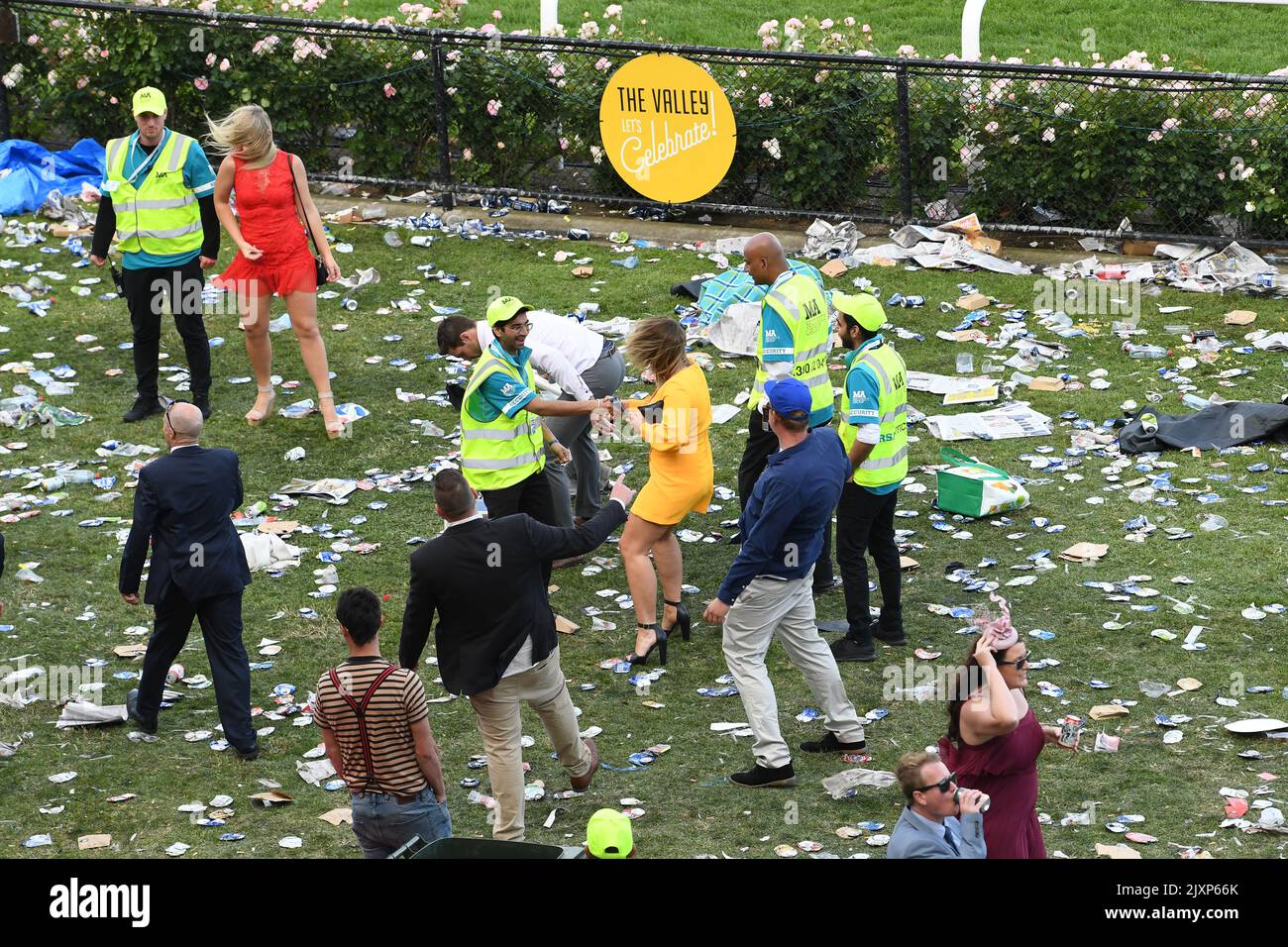 Racegoers are seen at the conclusion of Cox Plate Day at Moonee Valley ...