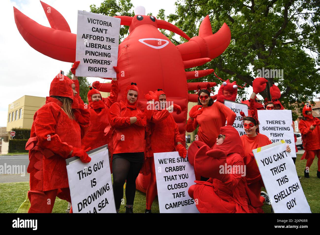 Protesters are seen outside the Victorian Liberal Party's official ...