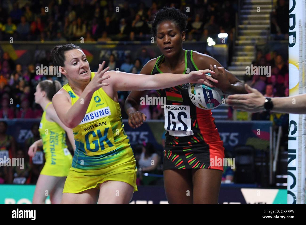 Sam Poolman (left) of Australia is seen in action during the Netball ...