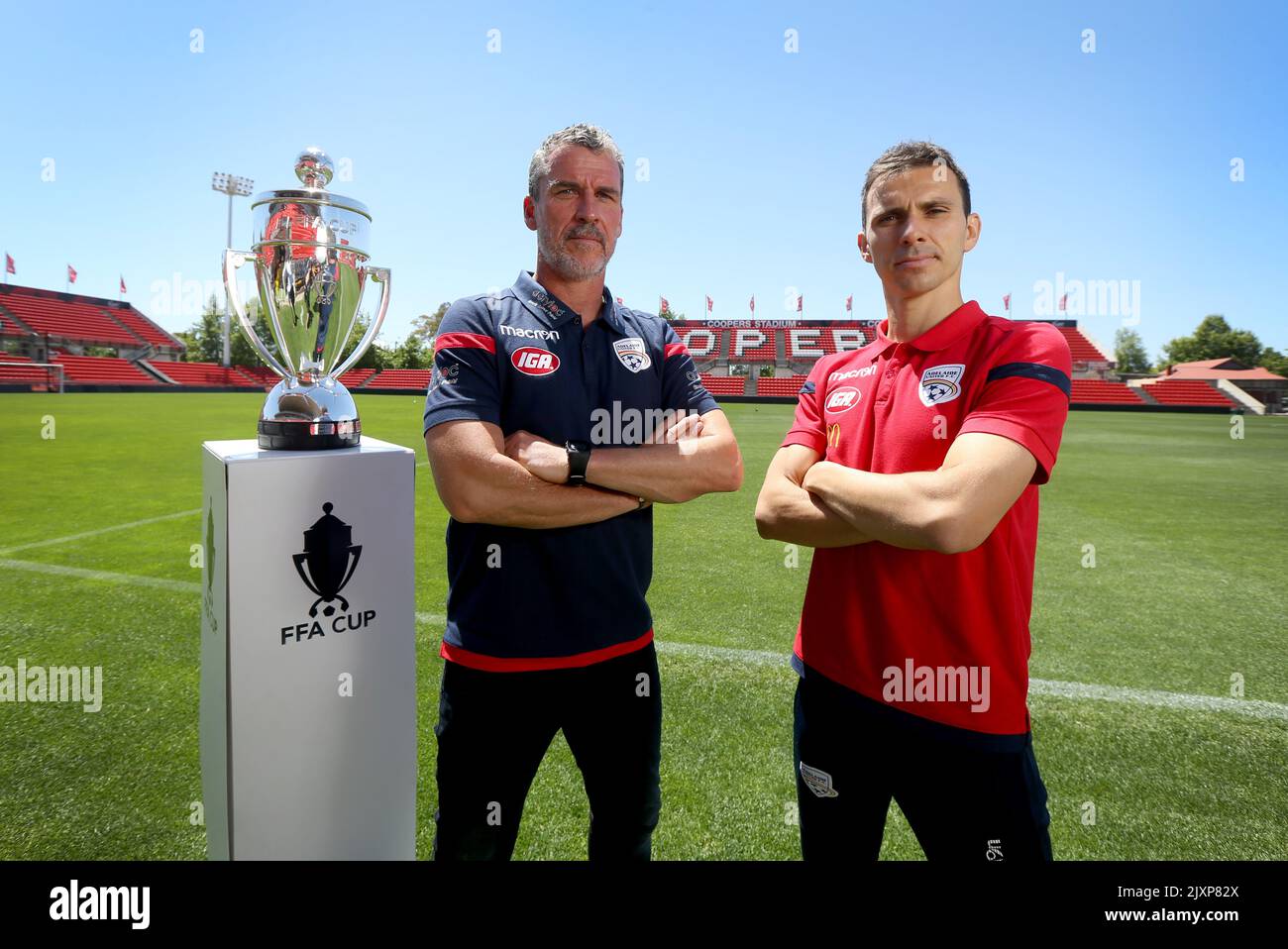 Adelaide United coach Marco Kurz and captain Isaias Sanchez pose for a ...