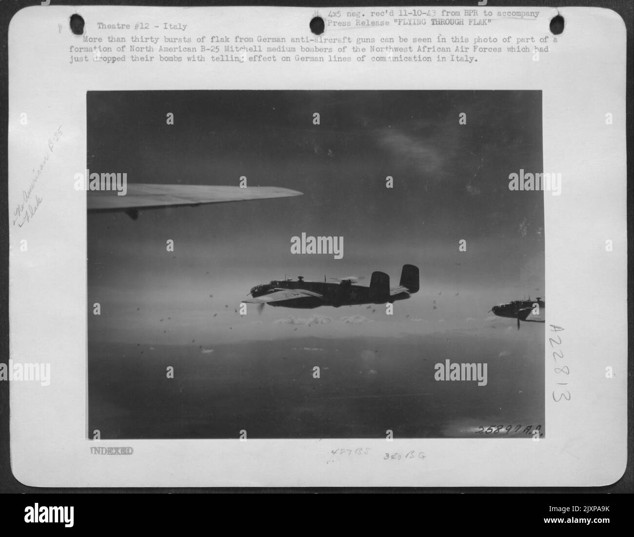 More than thirty bursts of flak from German anti-aircraft guns can be ...