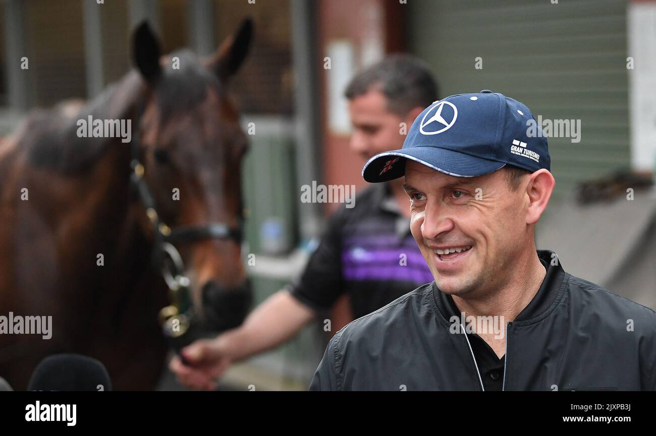 Trainer Chris Waller is seen with Winx at Flemington Racecourse in ...