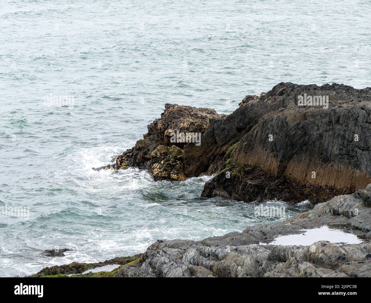 Wild rocks and sea, landscape, rock formation beside body of water ...